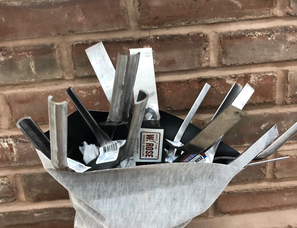 15 W.Roses in Grout-bag Vase – The Masonry Store